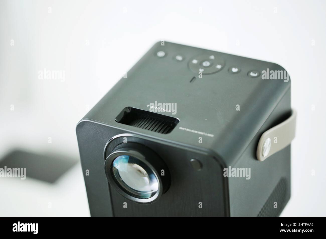 Photo of Blitzwolf portable projector with remote control isolated on a ...