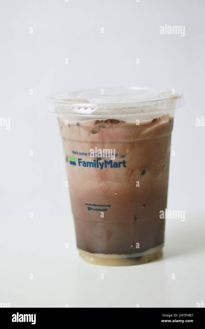 Vertical shot of the chocolate milkshake from the FamilyMart store on ...