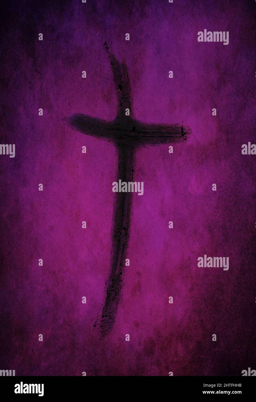 Vertical of ash cross traced with finger on purple background Stock ...
