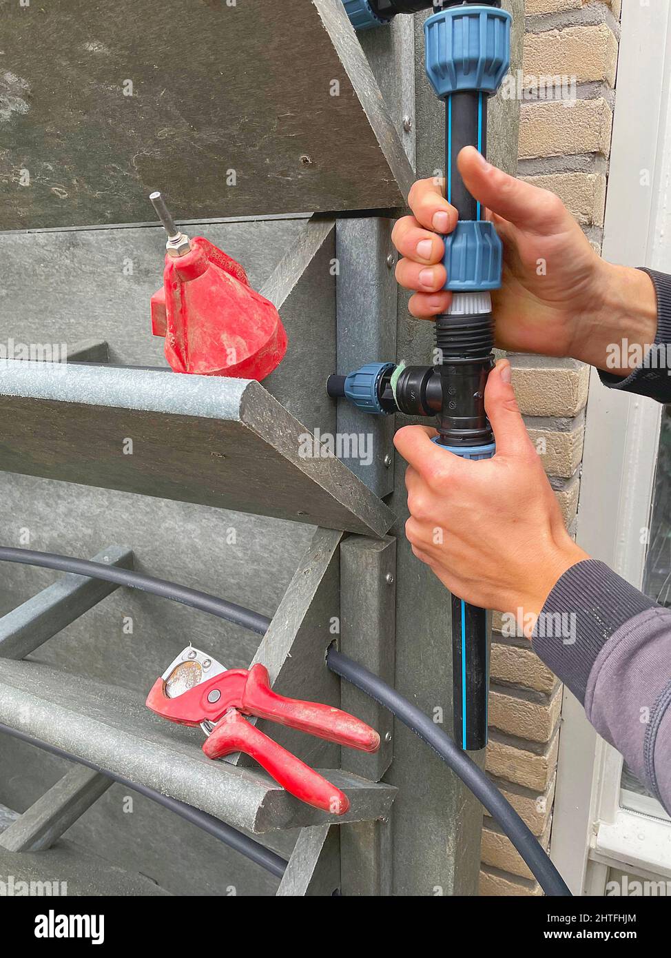 Irrigation system for watering a vertical green wall garden on behalf ...