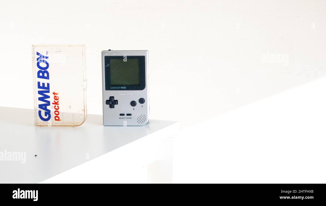 Gameboy silver on a white background Stock Photo - Alamy