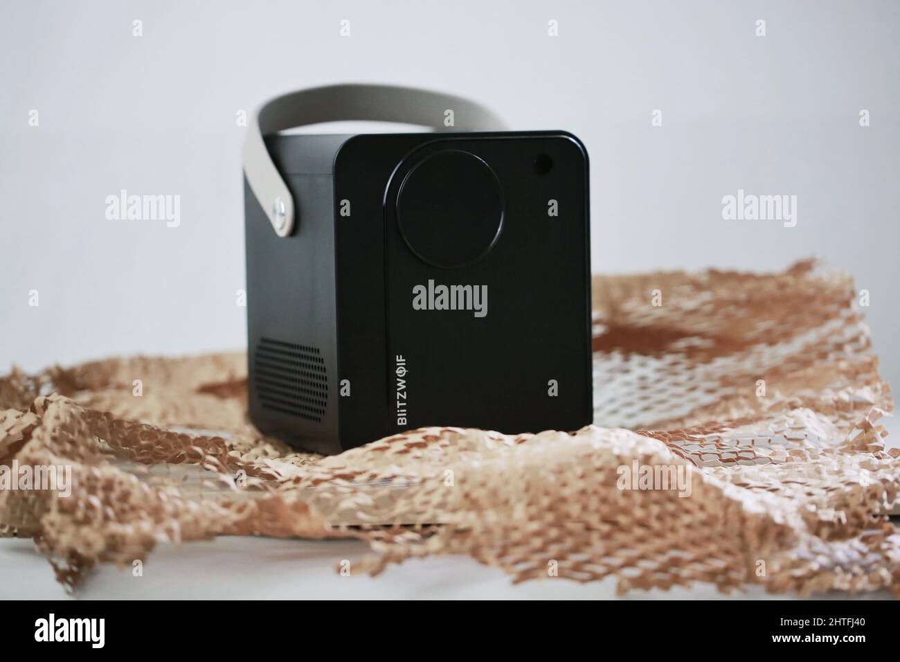 Photo of Blitzwolf portable projector with remote control isolated on a ...