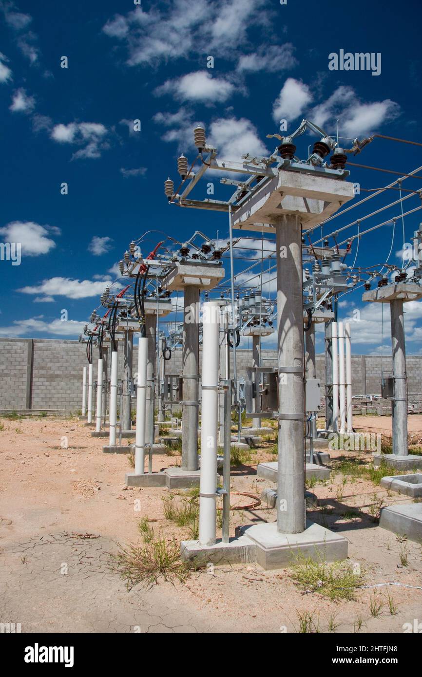 Vertical shot of the power plant construction area against a cloudy ...