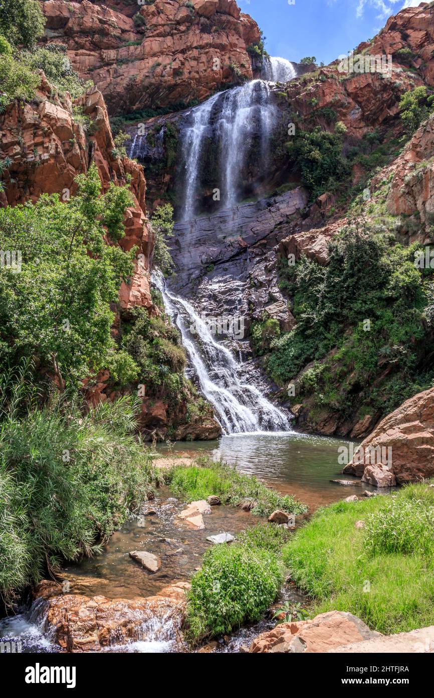 View of a waterfall and river in a mountainous area in Walter Sisulu ...