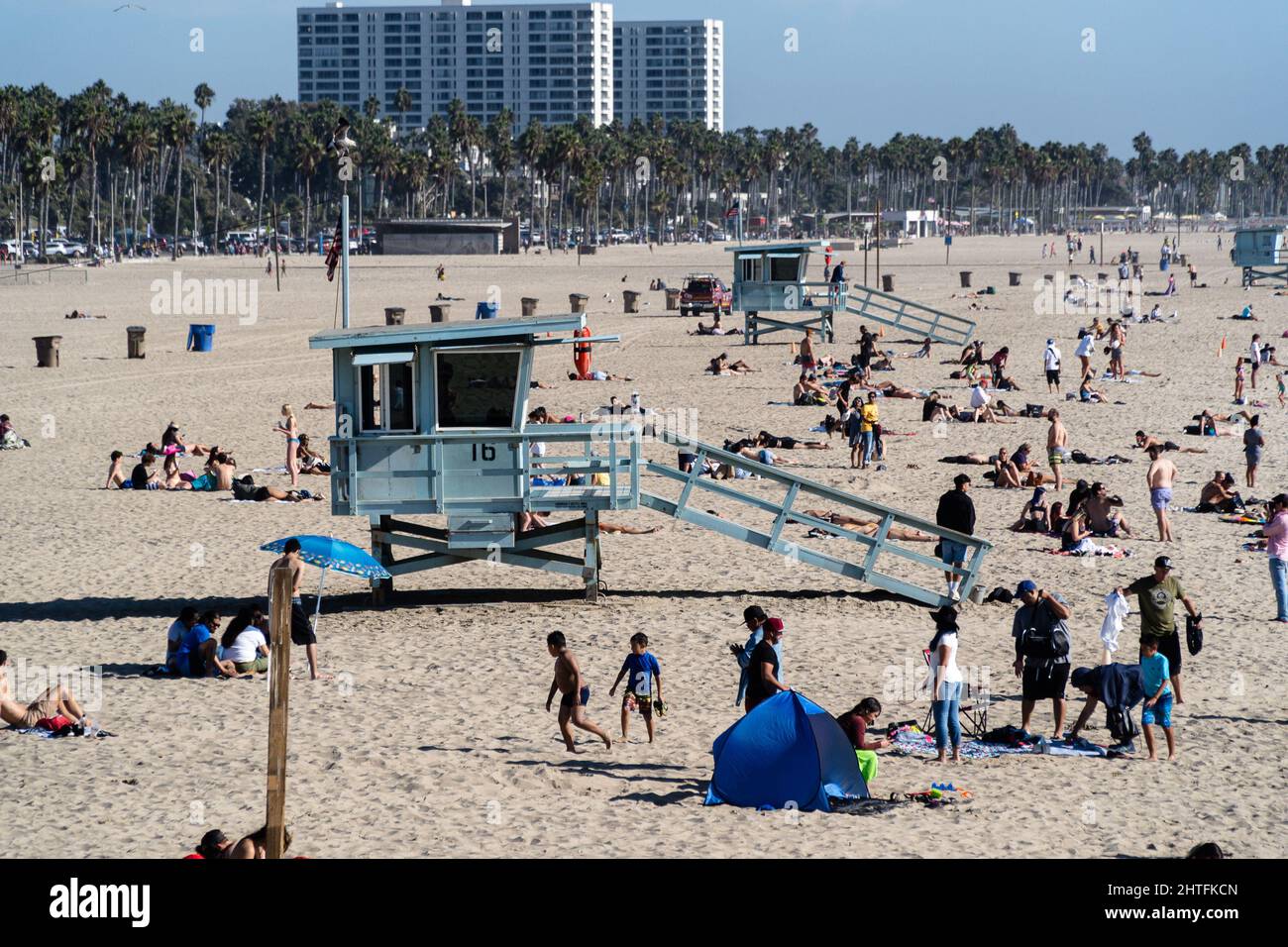 Lifeguard tower surrounded by many tourists in Santa Monica Beach, Los ...
