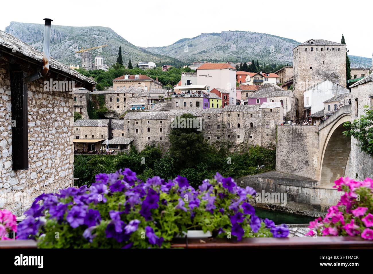 Scenic view of colorful flowers with buildings and restaurants in the ...