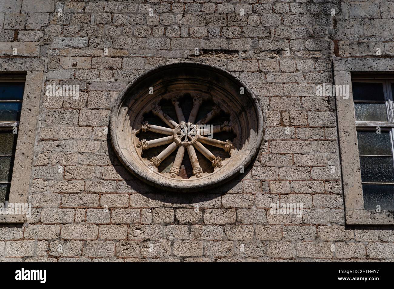 Photo of a circular old Turkish window design in a building in Kotor ...