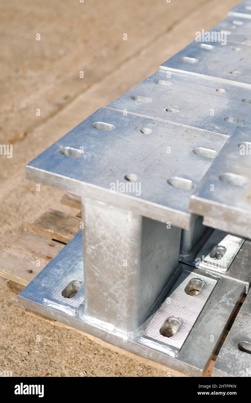 Vertical shot of steel connection plates Stock Photo - Alamy
