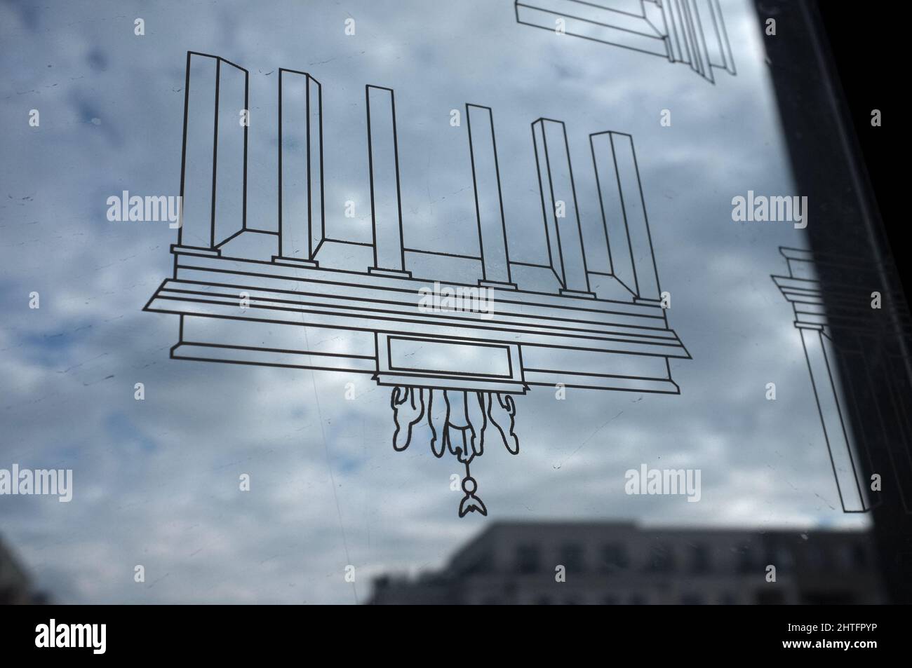 Closeup of patterns of the Brandenburg Gate's silhouette on a window ...