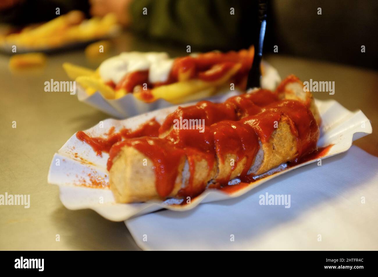 Closeup of a traditional german Curry Wurst from a diner called "Curry ...