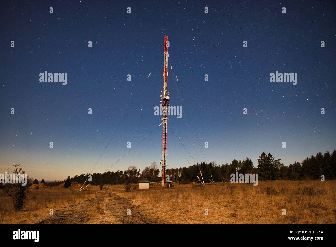 Radio tower under a starry night sky Stock Photo - Alamy