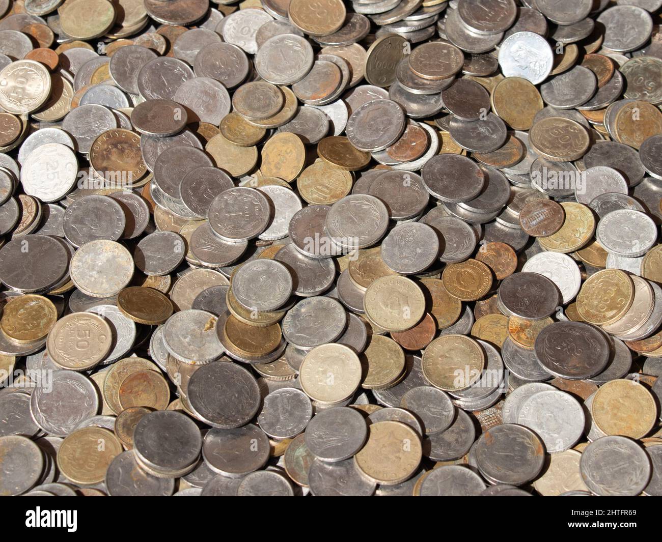 Different coins background Stock Photo - Alamy