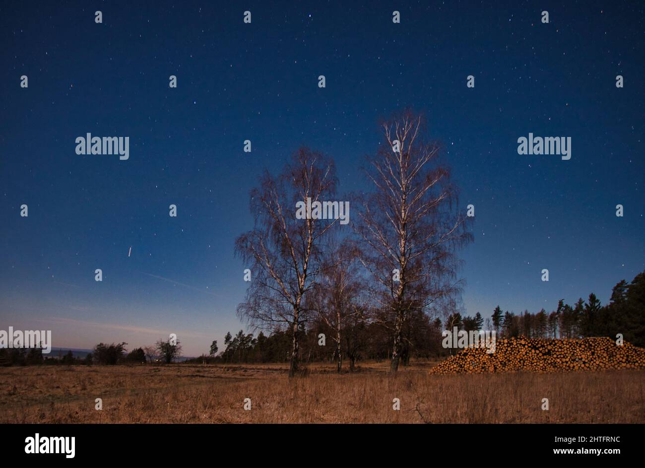 Rural area under starry night sky Stock Photo - Alamy