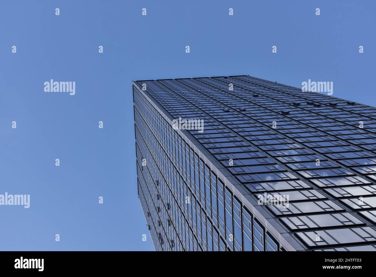Low angle shot of a modern tall building Stock Photo - Alamy
