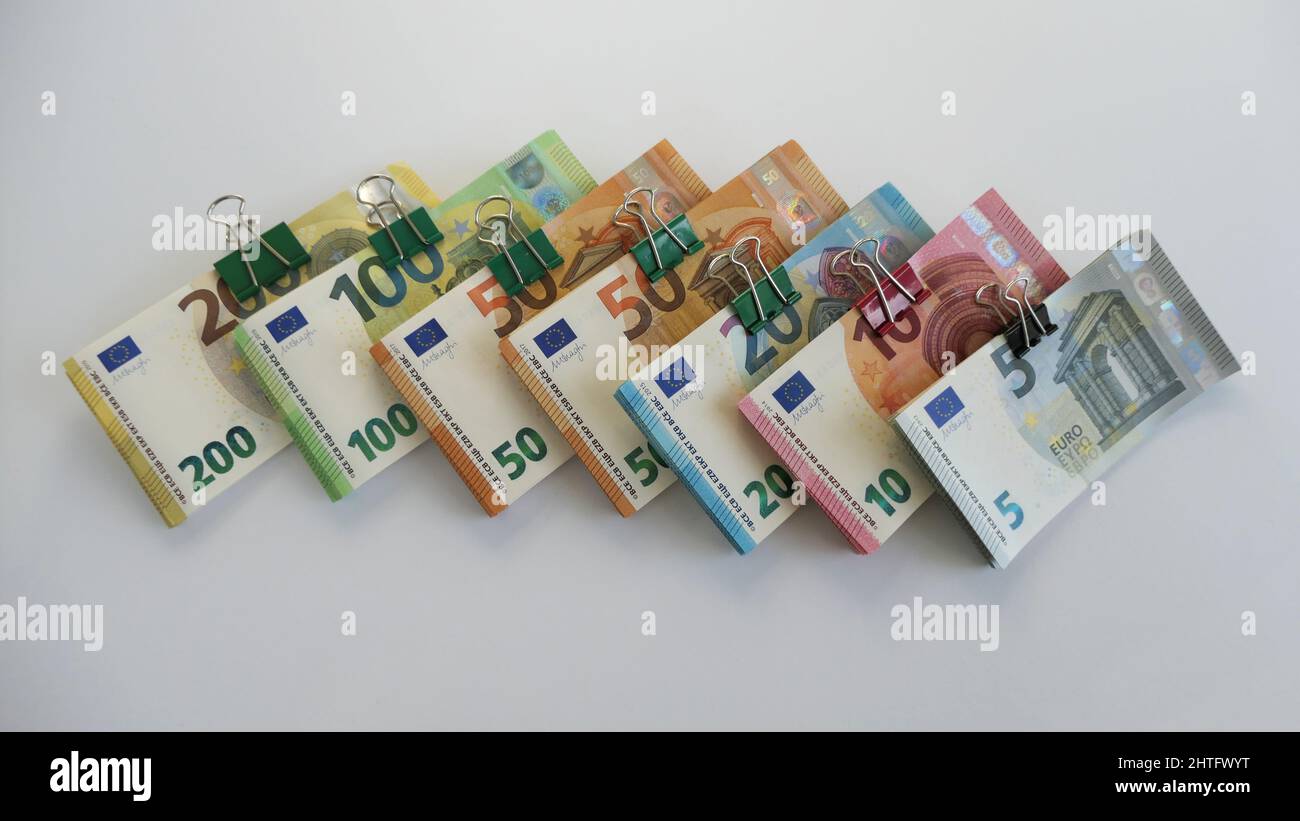stacks of all euro banknotes stuck together by a letter foldback clip ...