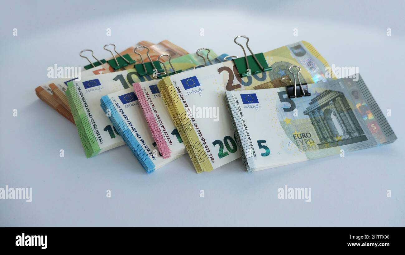 stacks of all euro banknotes stuck together by a letter foldback clip ...