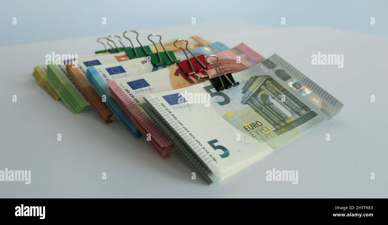 stacks of all euro banknotes stuck together by a letter foldback clip ...