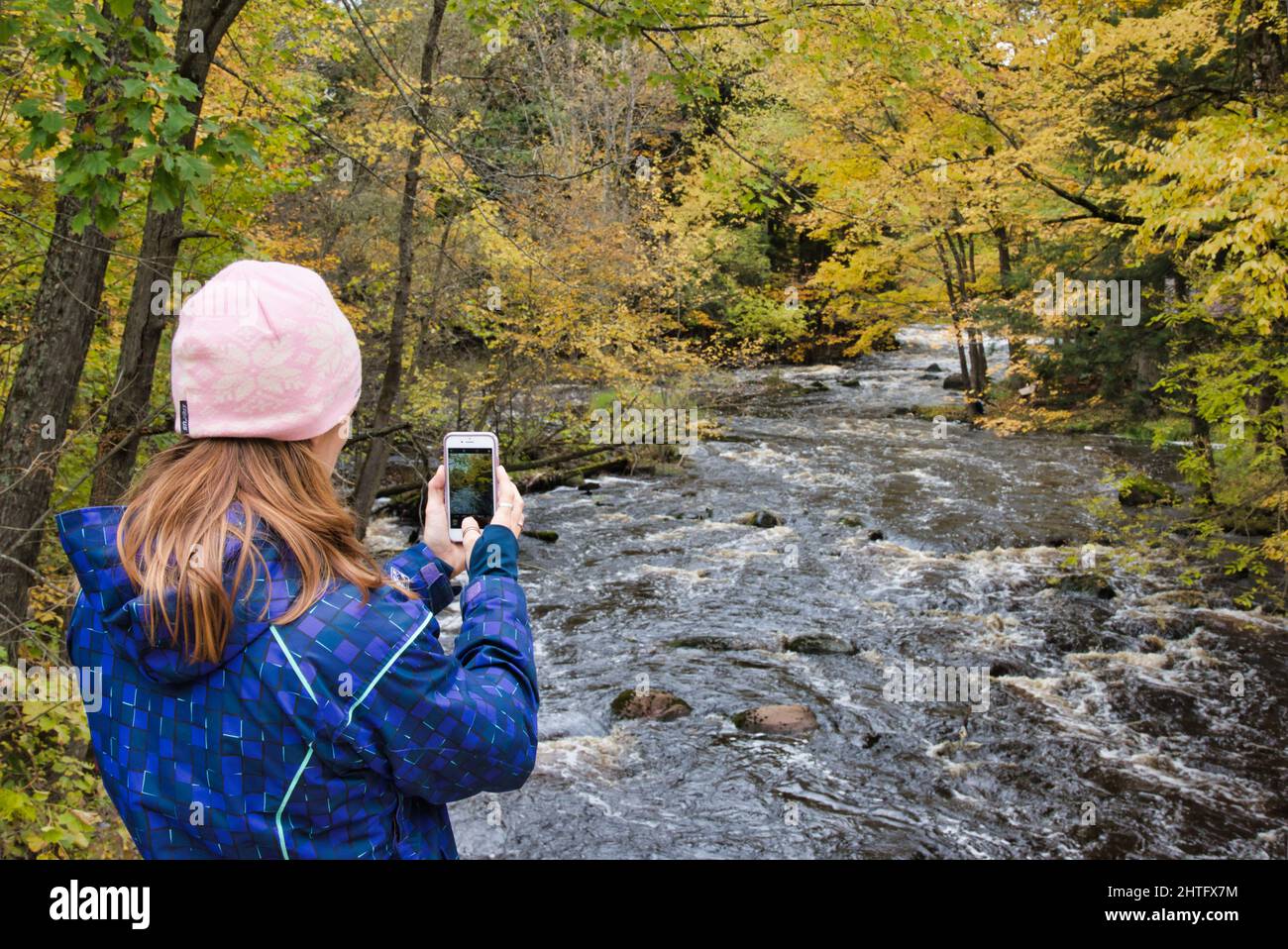 Blonde girl photographing river hi-res stock photography and images - Alamy