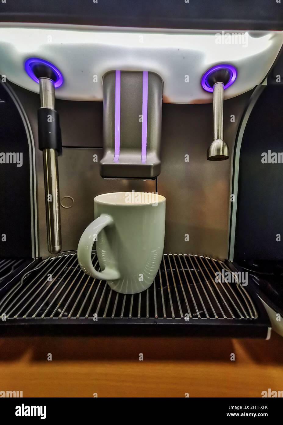 Modern coffee machine in the kitchen Stock Photo - Alamy