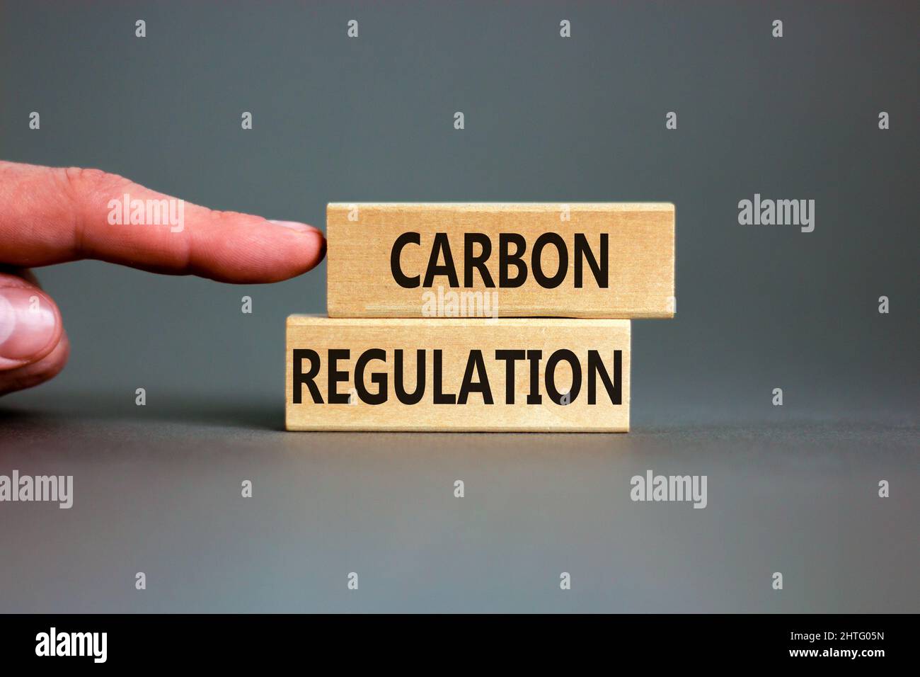 Carbon regulation symbol. Concept words Carbon regulation on wooden ...