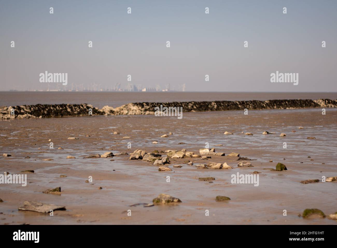 Beautiful seascape with partly collapsed seawall in it Stock Photo - Alamy