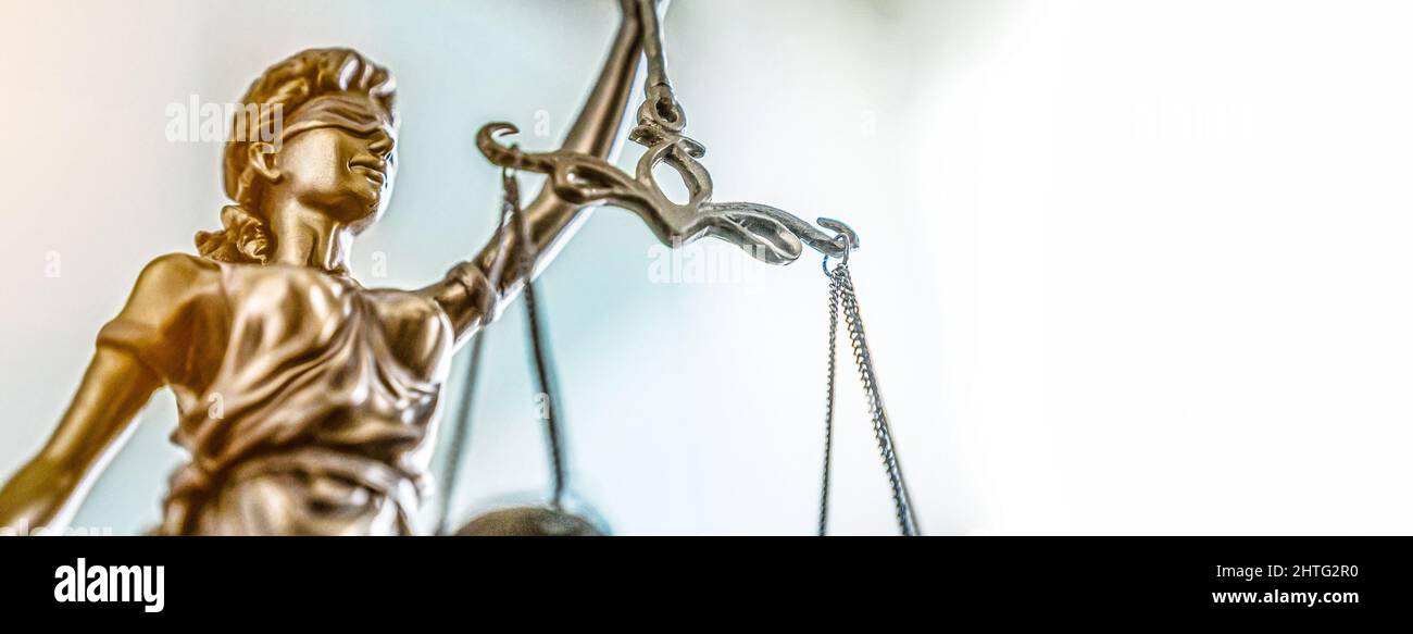 Statue of lady justice on bright background - Side view with cop Stock ...