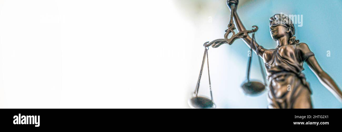 Statue of lady justice on bright background - Side view with cop Stock ...