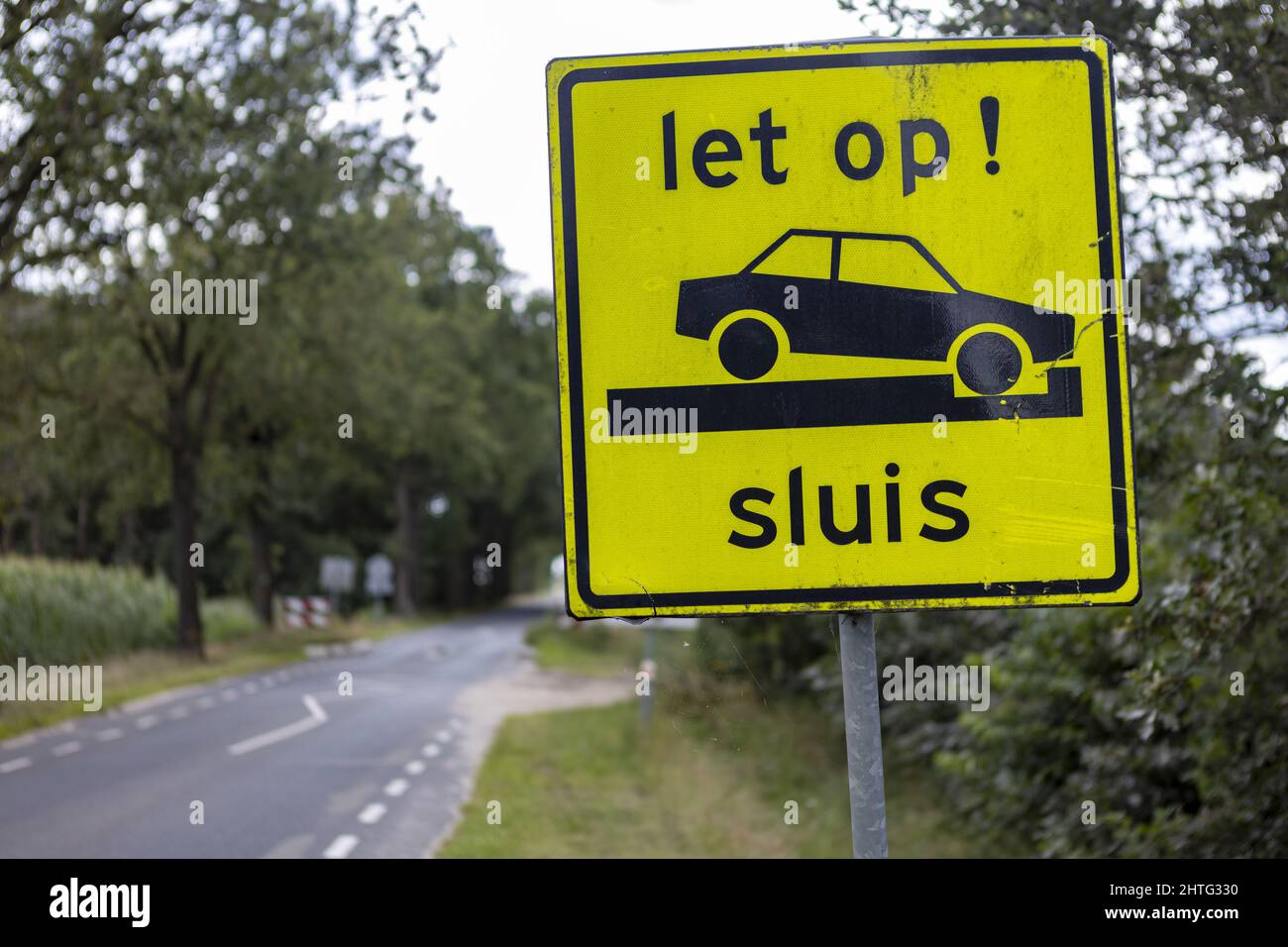 Bright yellow Dutch traffic sign Stock Photo - Alamy