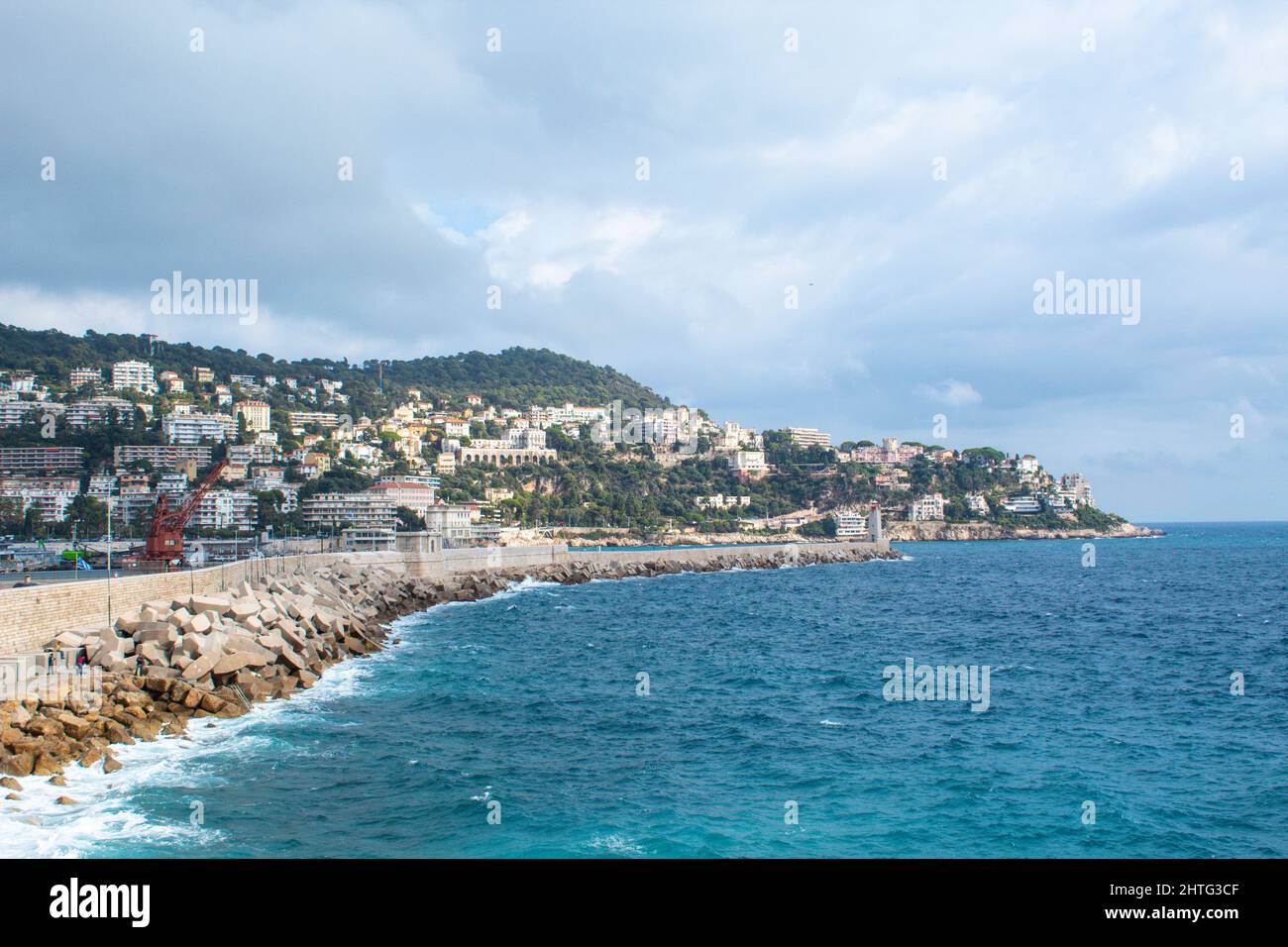 Wavy ocean hitting the sandy beach in Nice, France Stock Photo - Alamy