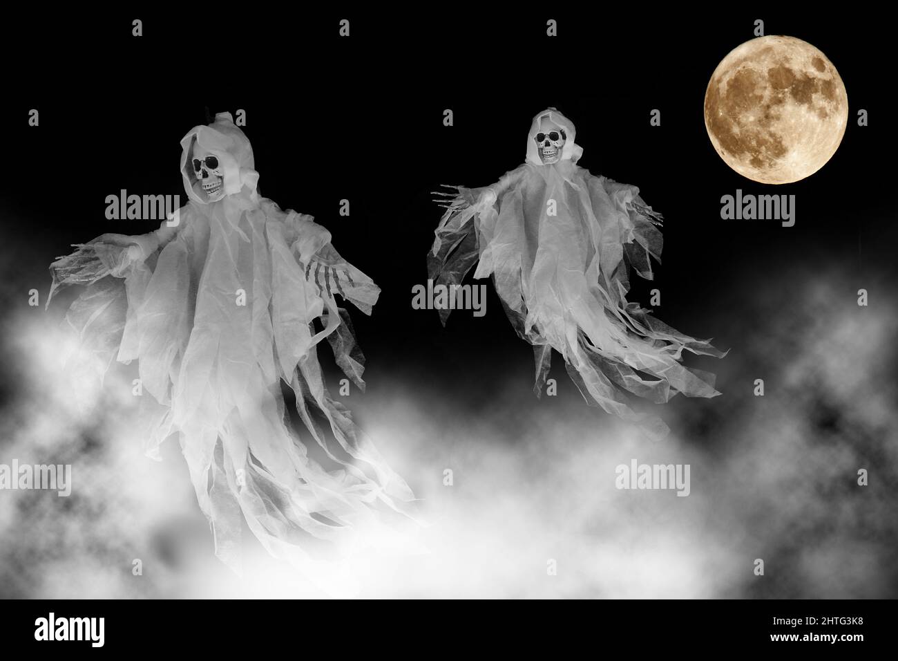 Illustration of skeletal ghosts and a blood moon with smoky effect ...