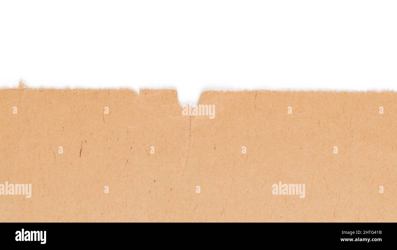 Old yellow craft paper torn edge. Isolated on white background ...