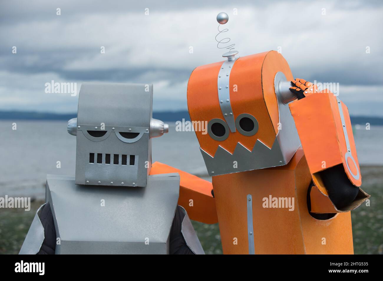 Two robot friends hugging and dialing it in. Good robot friends. Or ...