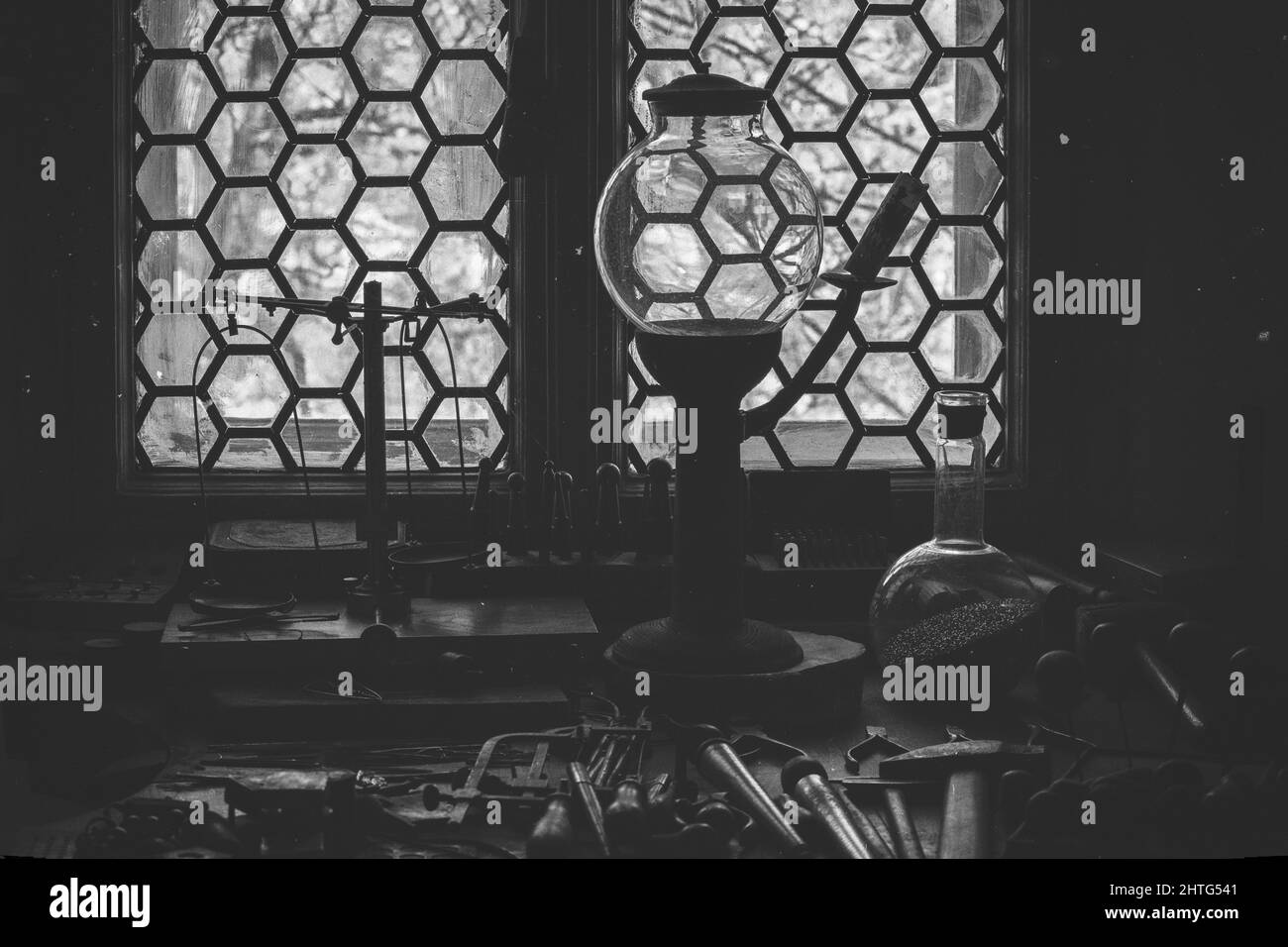 Grayscale of various objects on a table Stock Photo - Alamy