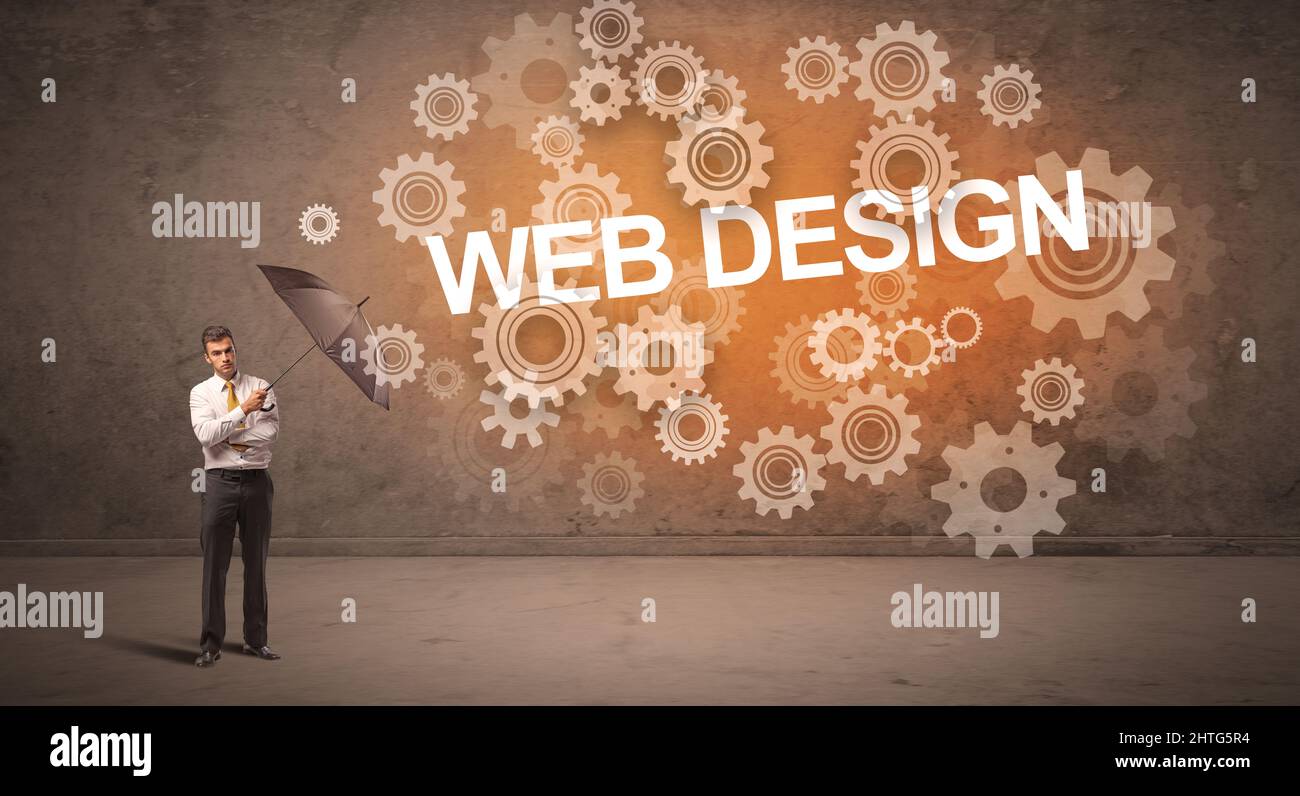 Businessman defending with umbrella concept Stock Photo - Alamy