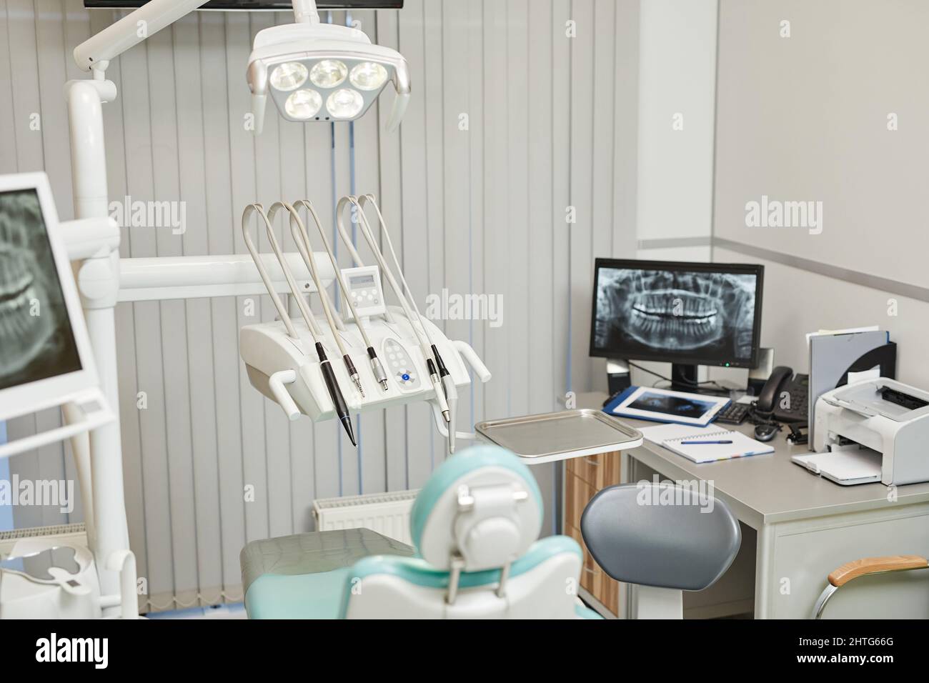 Background image of dental clinic with modern equipment and teeth x-ray ...