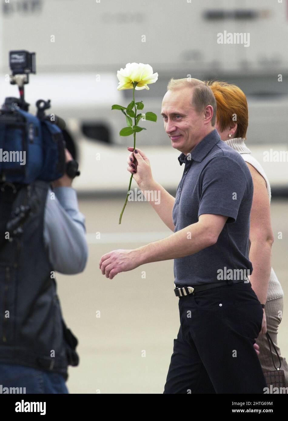 Russian President VLADIMIR PUTIN and wife LYUDMILA PUTINA, (holding a ...
