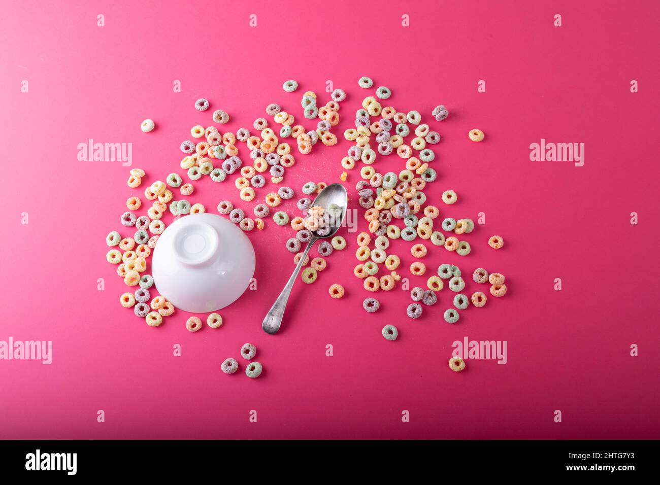 High angle view of upside down bowl and spoon with ring shaped ...