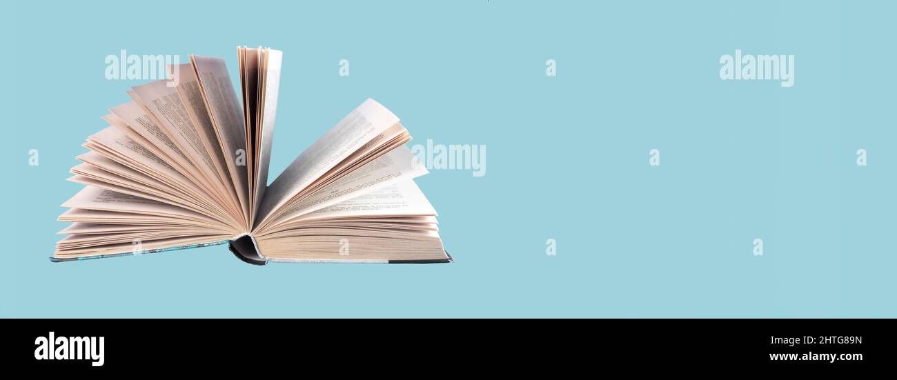 Open book blue background hi-res stock photography and images - Alamy