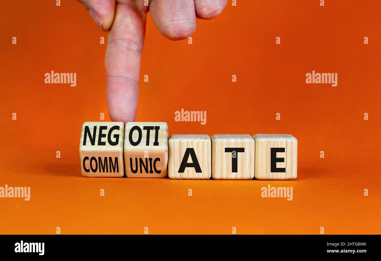 Negotiate and communicate symbol. Businessman turns cubes and changes ...