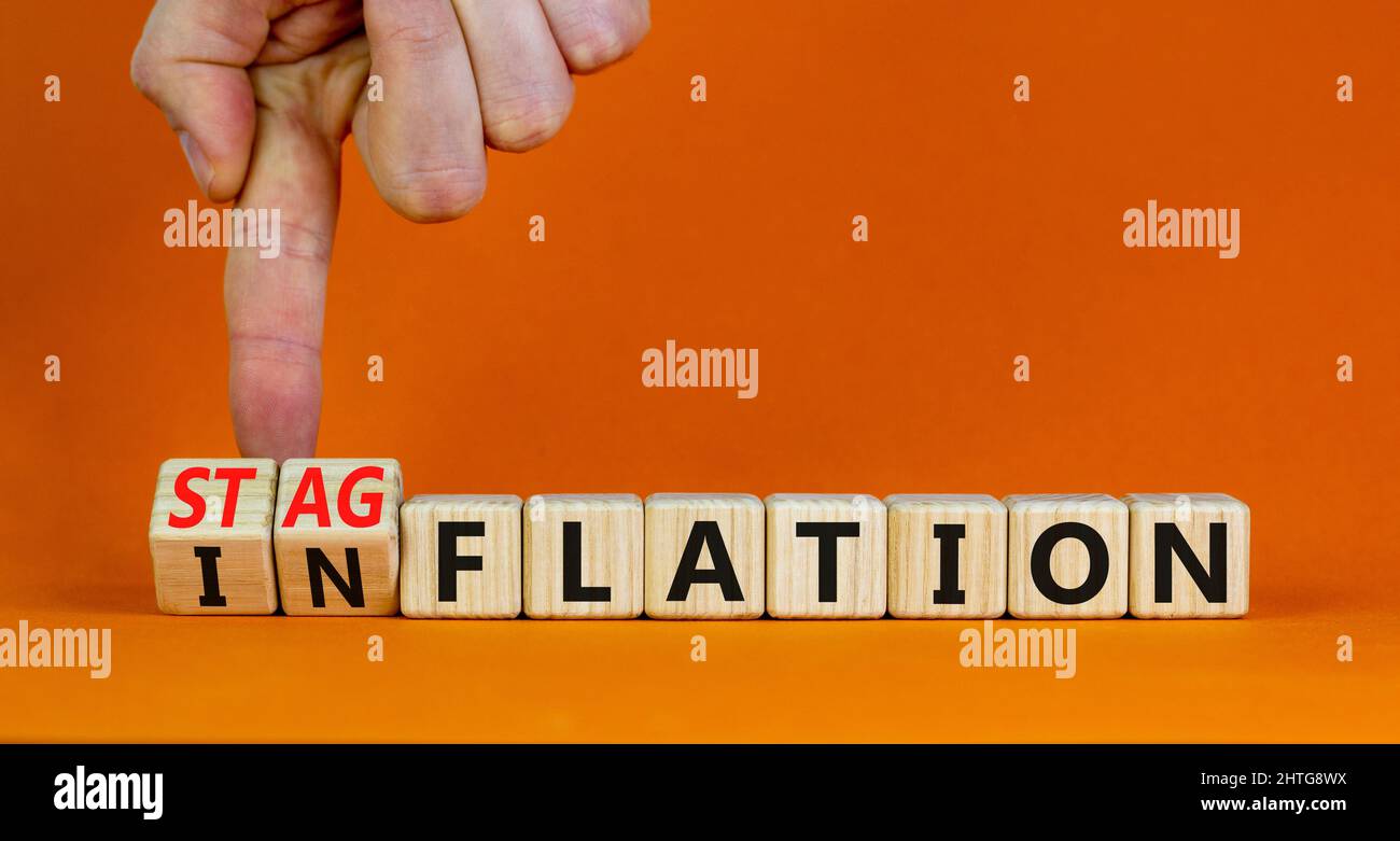 Stagflation or inflation symbol. Businessman turns cubes and changes ...