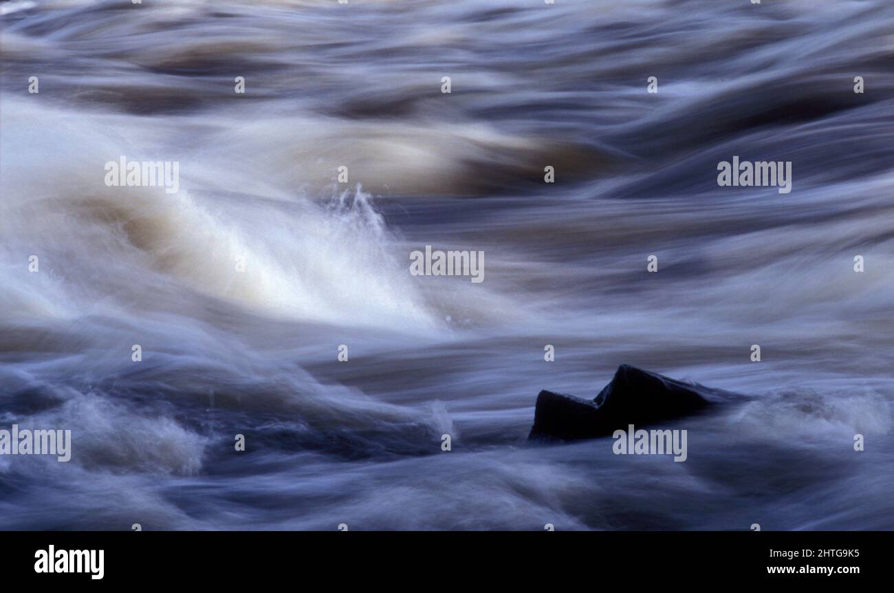 Wild river rapids in the country in 2005, analog. Fast, strong, and ...