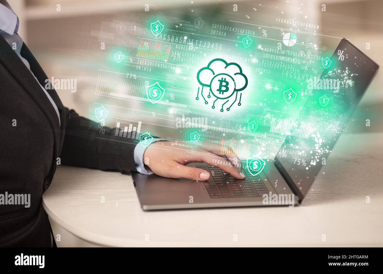 Young man watching stock market on laptop Stock Photo - Alamy