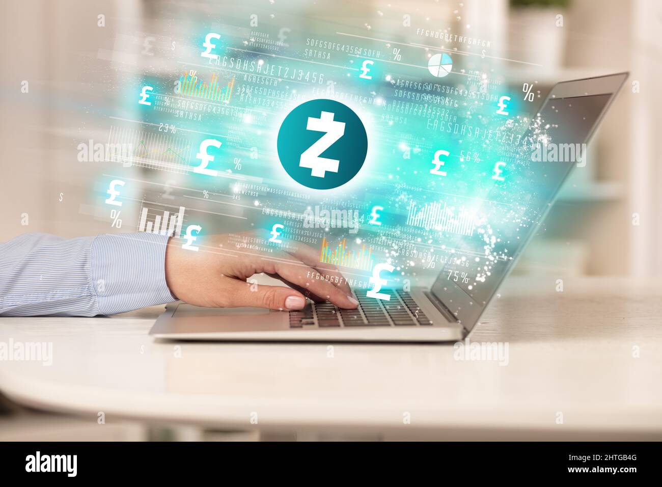 Young man watching stock market on laptop Stock Photo - Alamy