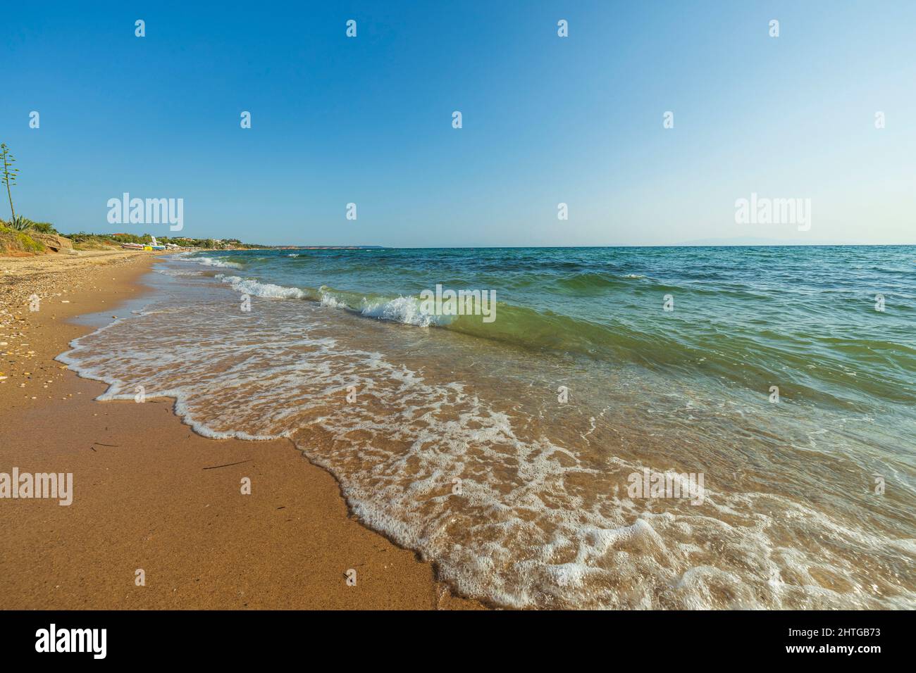 Gorgeous view of foamy waves on sand coast. Beautiful colorful nature ...