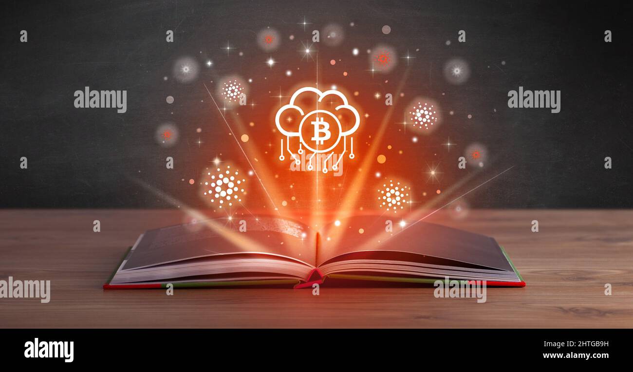 Open book with currency icons above Stock Photo - Alamy
