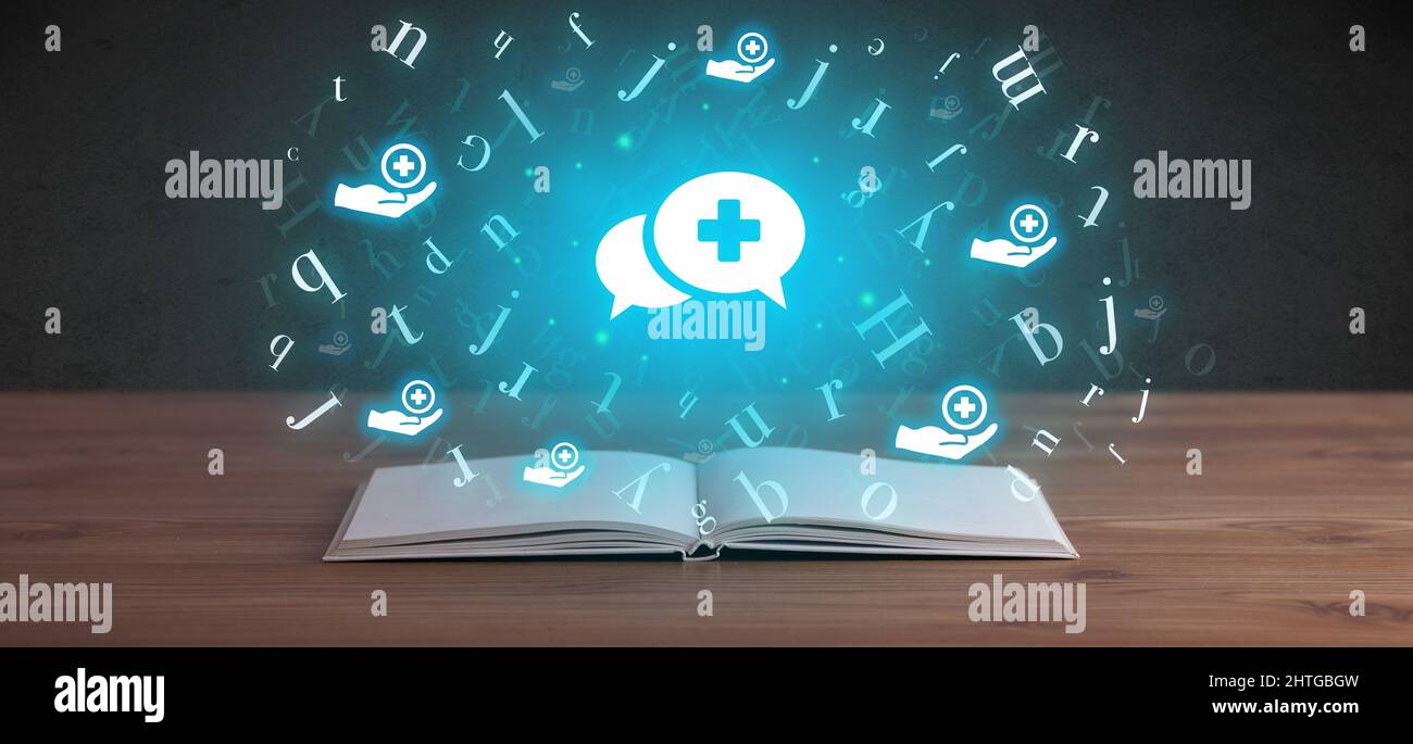 Open medical book with health icons above Stock Photo - Alamy