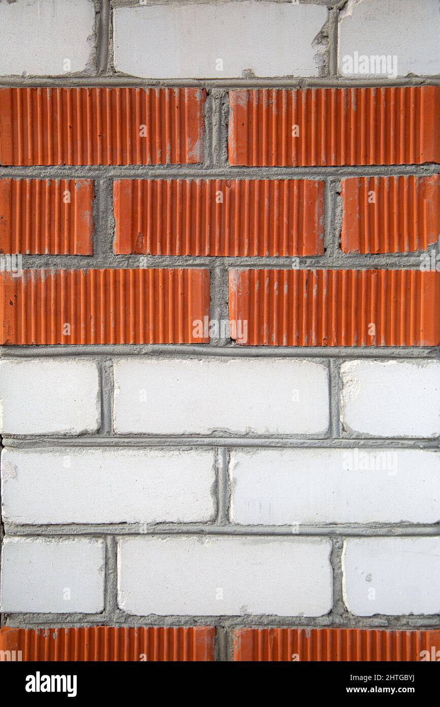 background with red and white brick masonry Stock Photo - Alamy