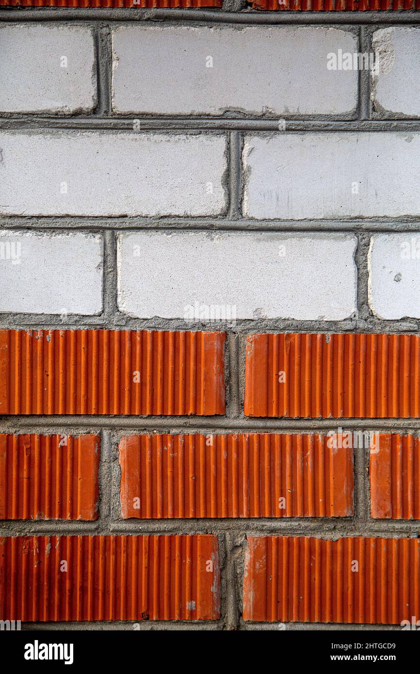 background with red and white brick masonry Stock Photo - Alamy
