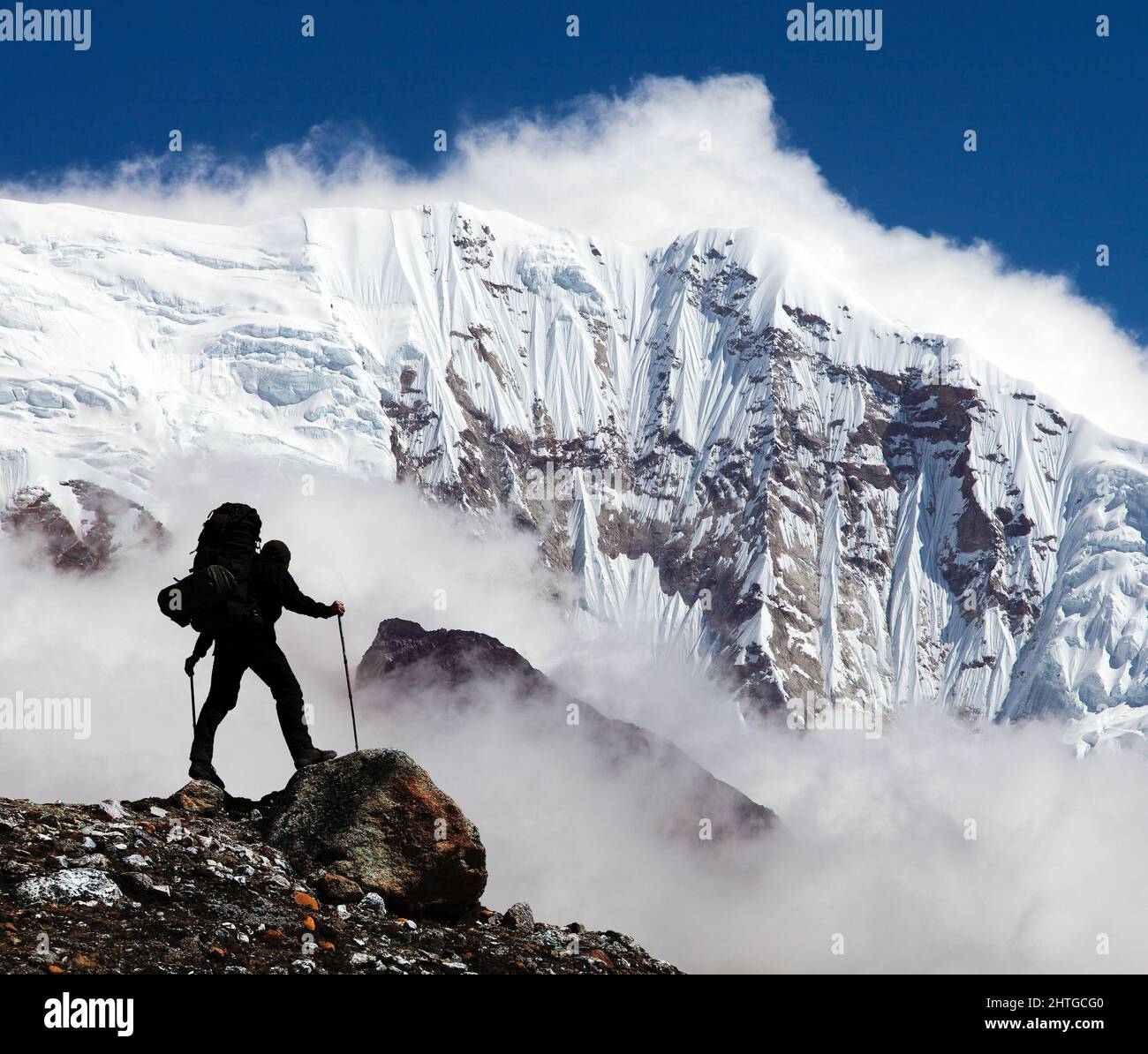 Silhouette of man and mountains with clouds, Nepal himalaya mountain ...