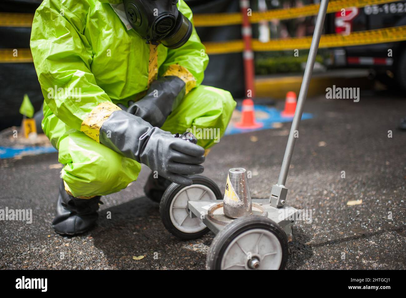 A member of Colombia's Anti-Terrorist Police demonstrates how ...